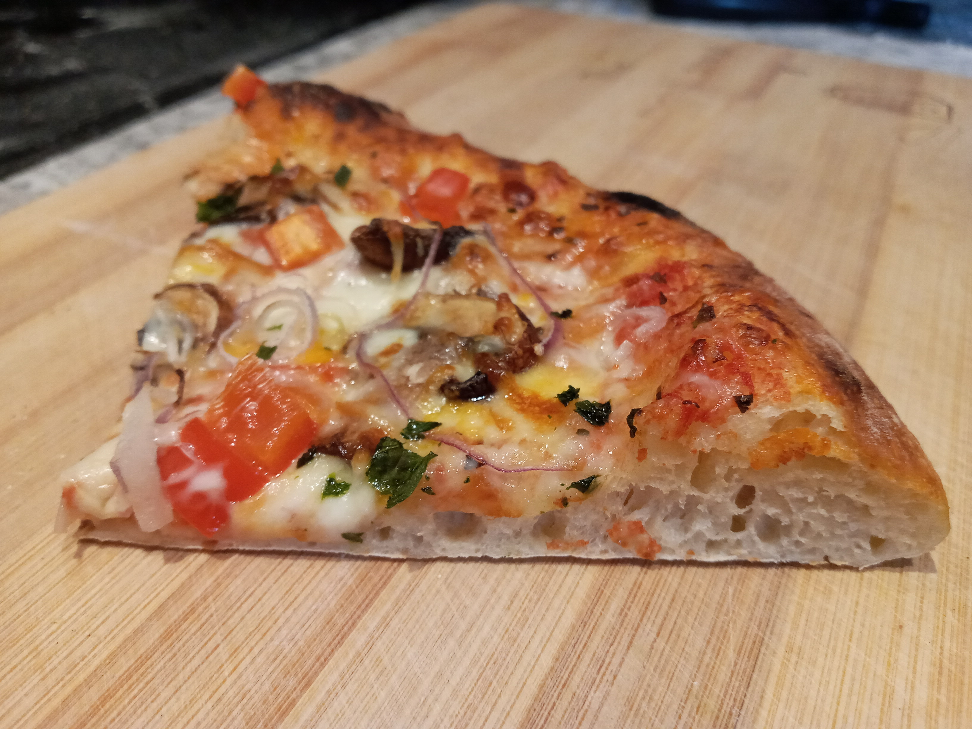 70% hydration, turned out good for a home oven. : Pizza