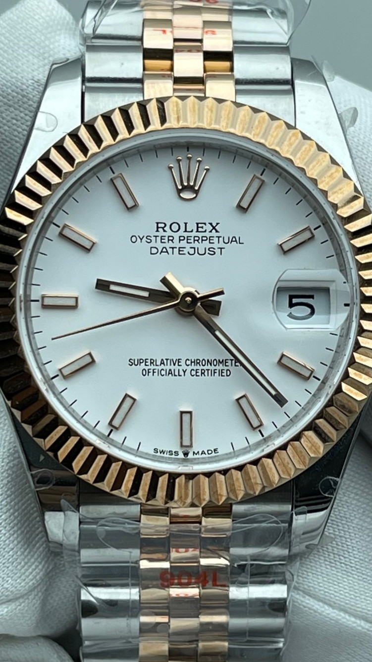 QC Question - Crown logo twisted? | Replica Watch Info