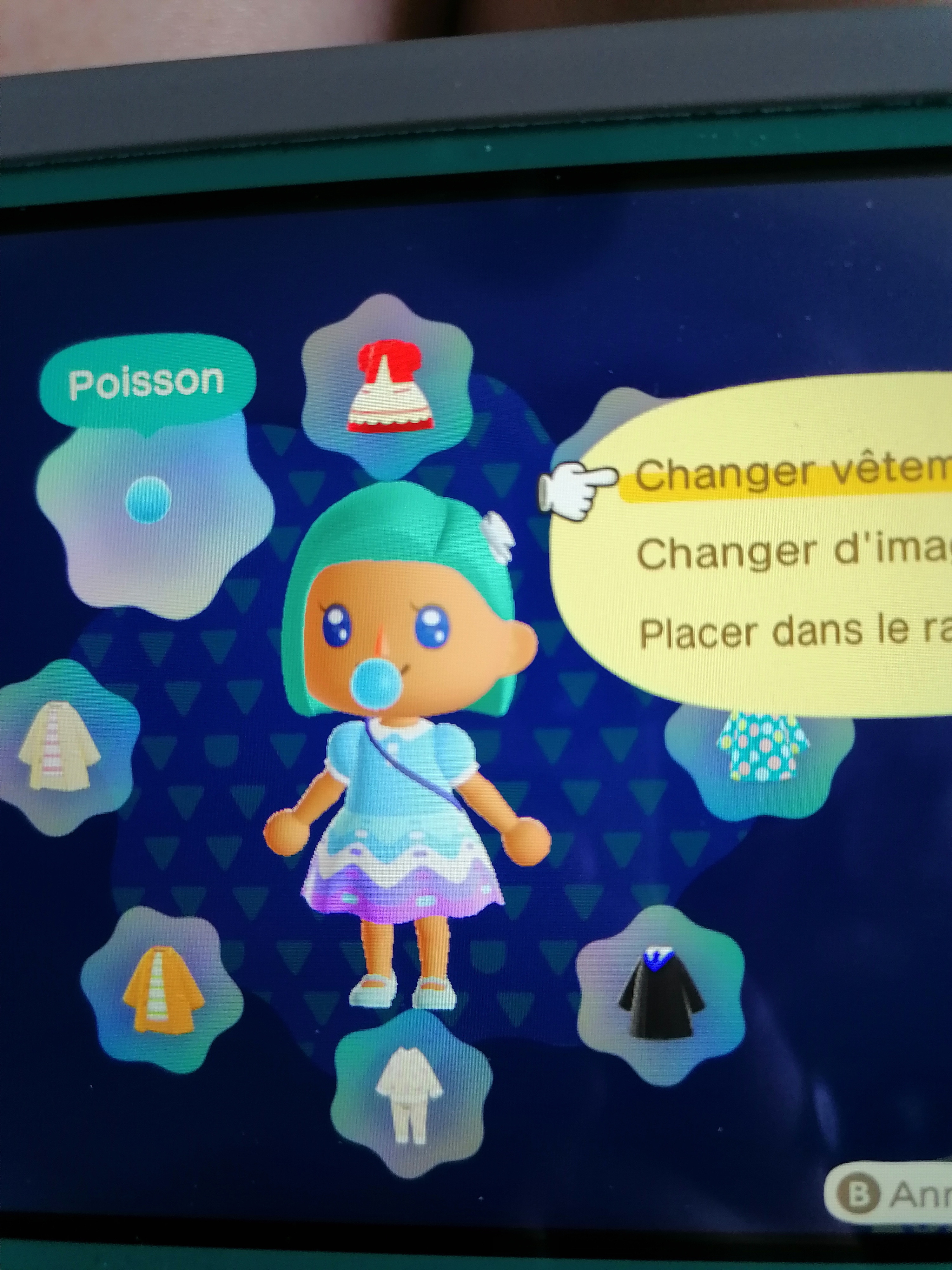 I am so happy! The fish pochette fits perfectly with the ocean dress I ...