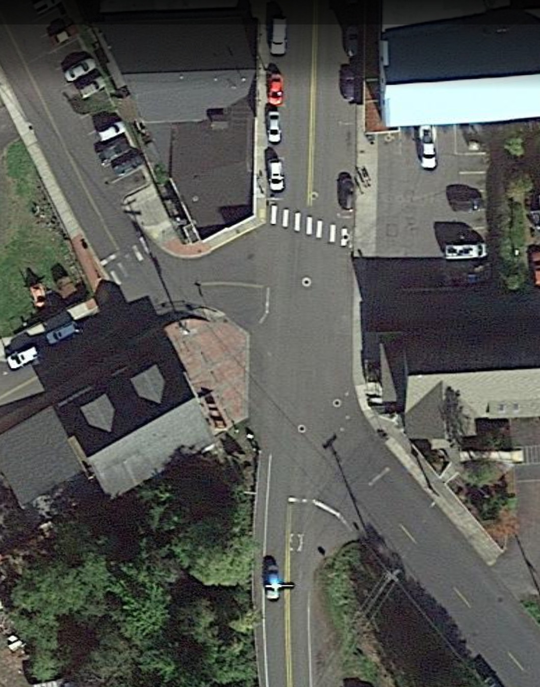 Three way stop sign. Those coming from straight ahead do not have a ...