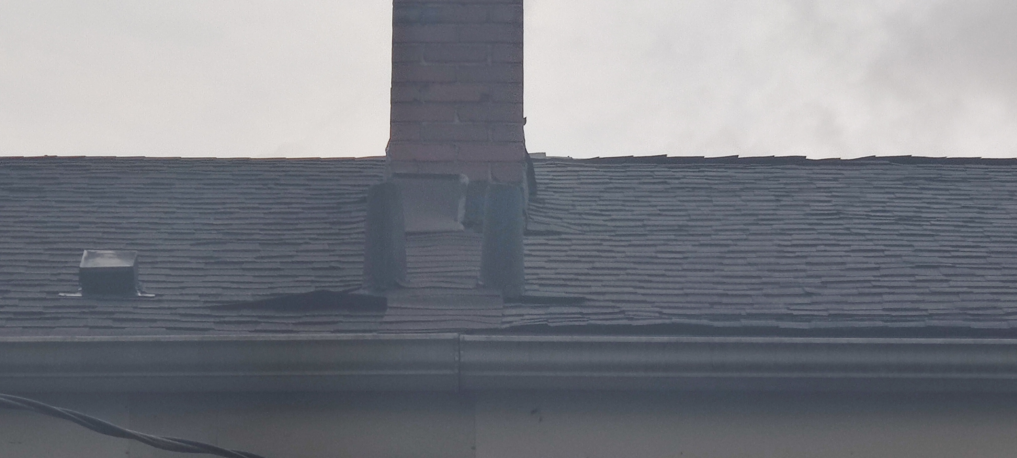 Chimney flashing lifting off roof. What is the best way to secure it ...