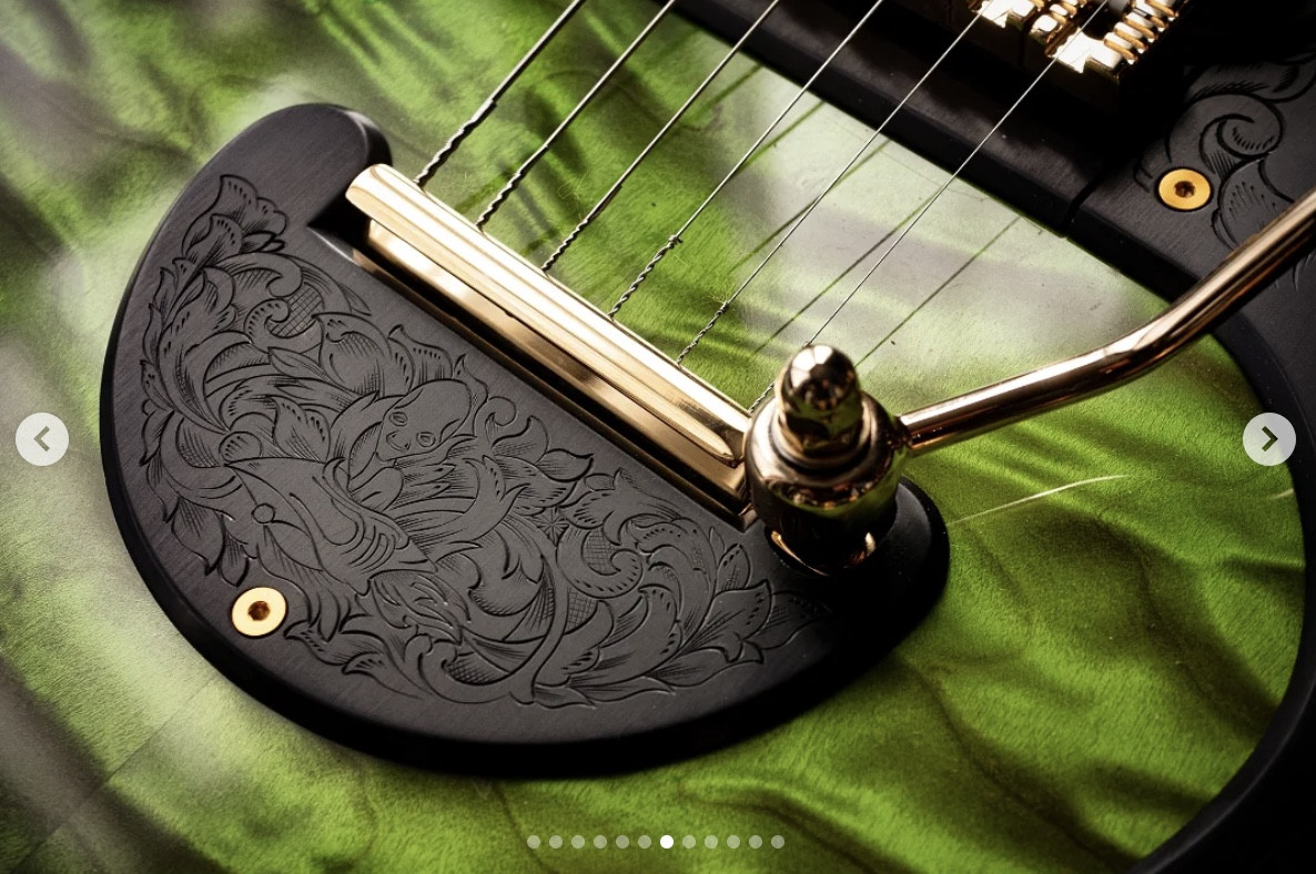 The Steve Vai Red Special (except it's green). Yup Steve has a Brian ...