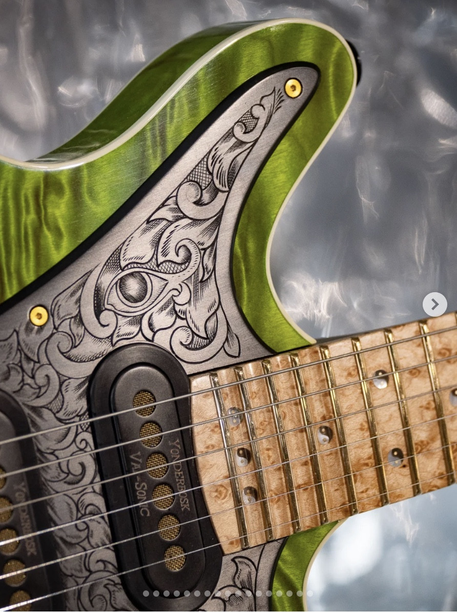 The Steve Vai Red Special (except it's green). Yup Steve has a Brian ...