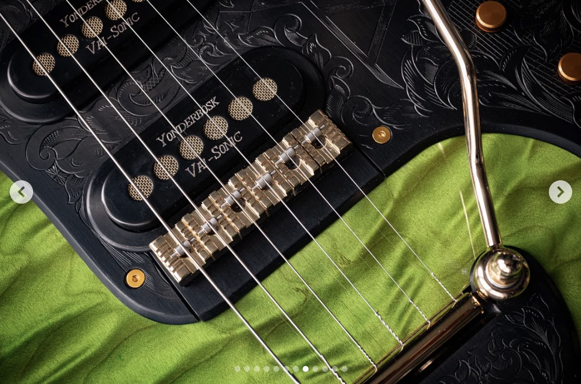 The Steve Vai Red Special (except it's green). Yup Steve has a Brian ...