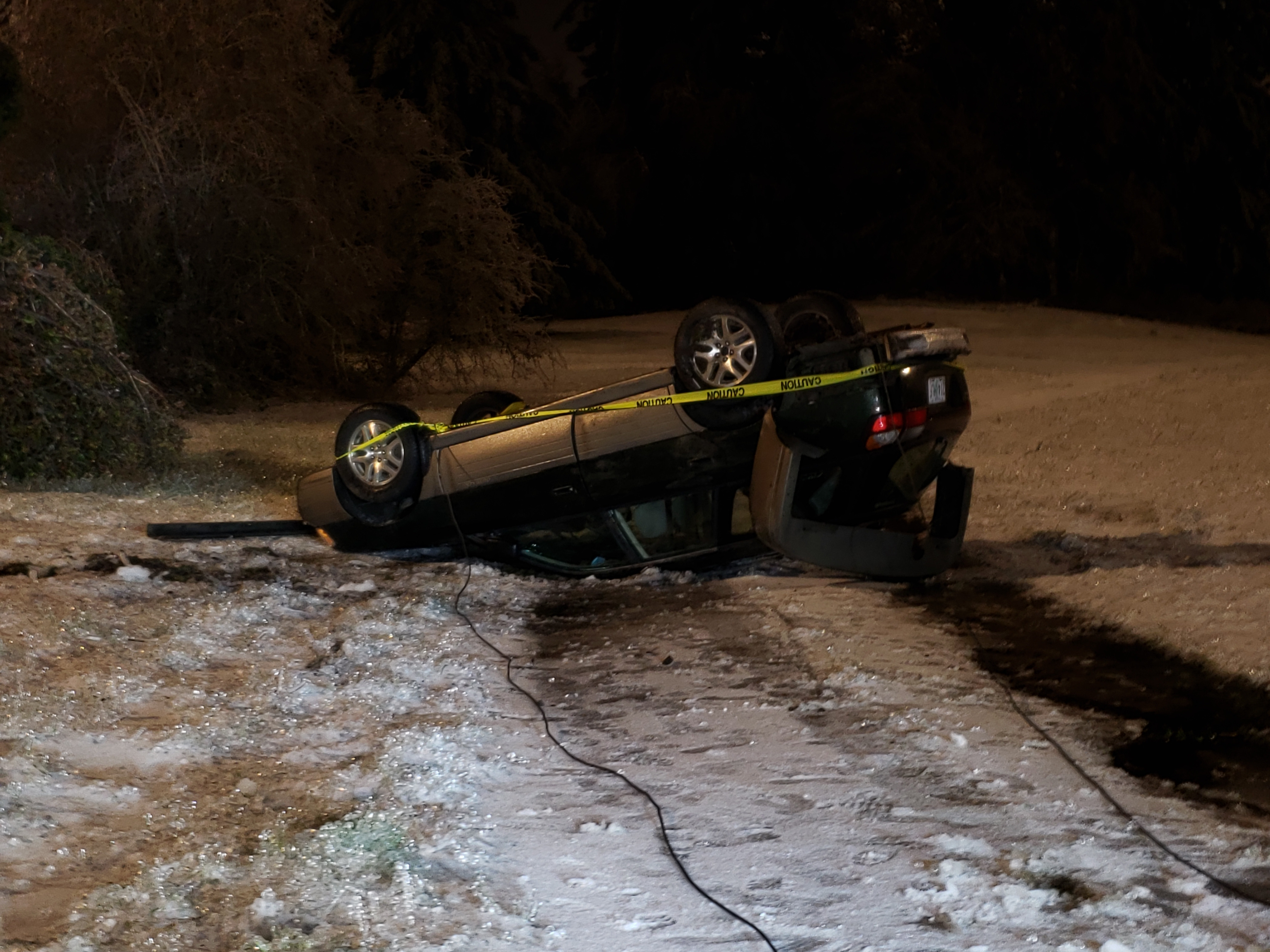 This car rolled, and a light bulb got stuck through the seat belt ...